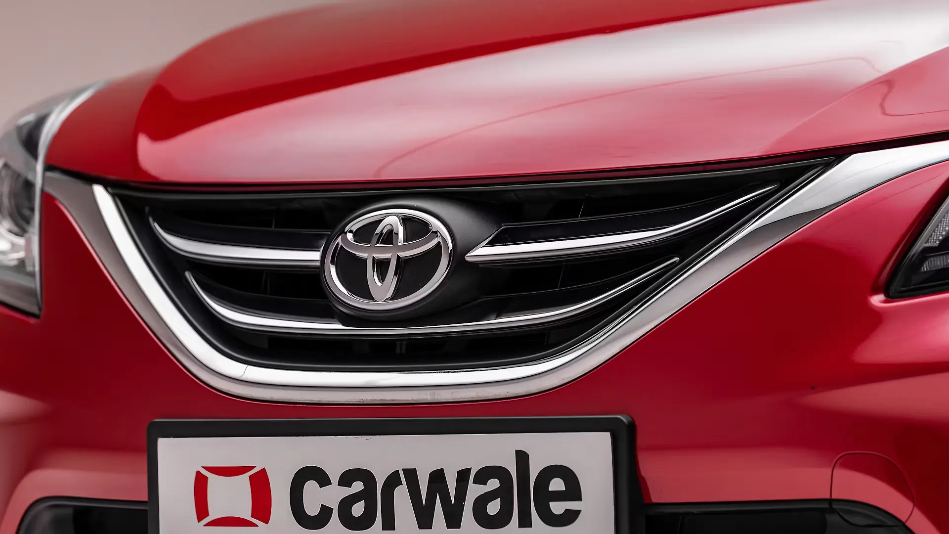 Glanza Front Logo Image, Glanza Photos in India - CarWale Glanza Front Logo Image, Glanza Photos in India - CarWale