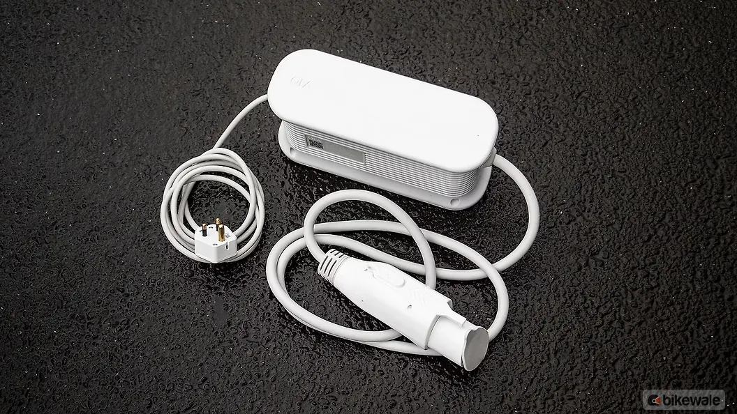 OLA S1 Air Electric Bike Charging Input Plug Image – BikeWale