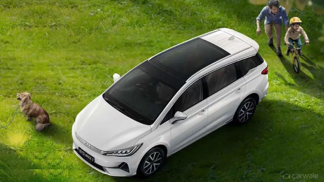 eMax 7 Left Side View Image, eMax 7 Photos in India - CarWale