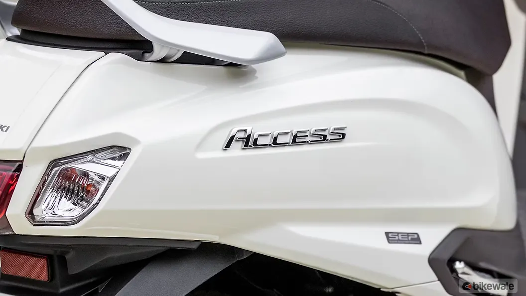 Suzuki Access 125 Right Side Body Panel Badge Image – BikeWale