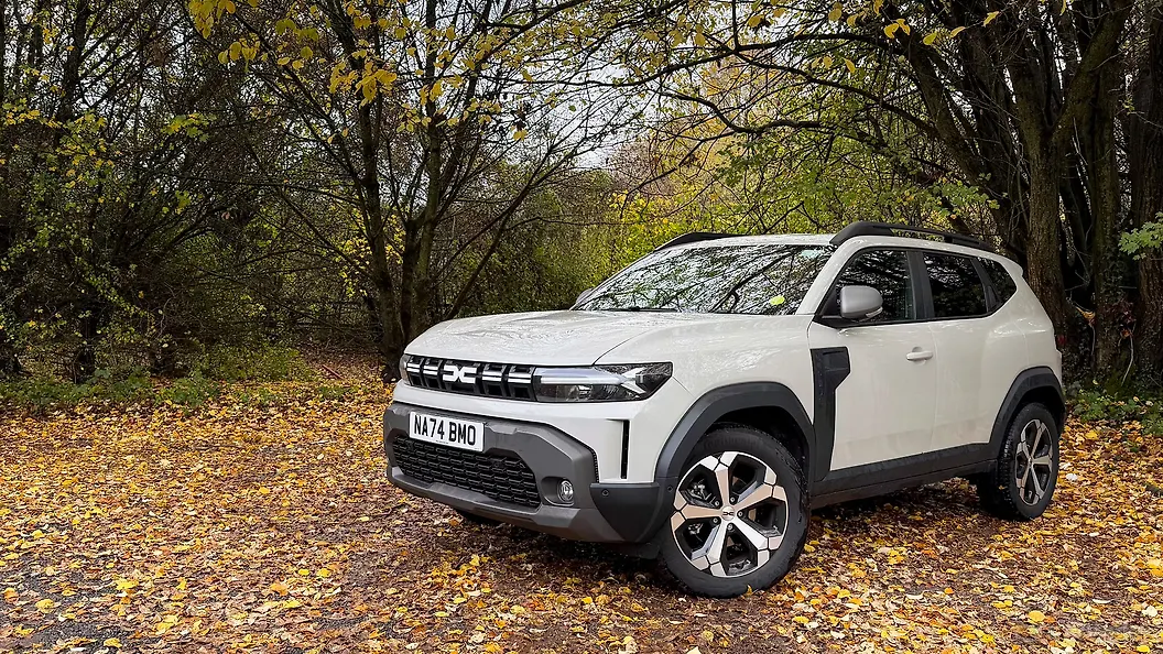 New Duster Left Front Three Quarter Image, New Duster Photos in India ...