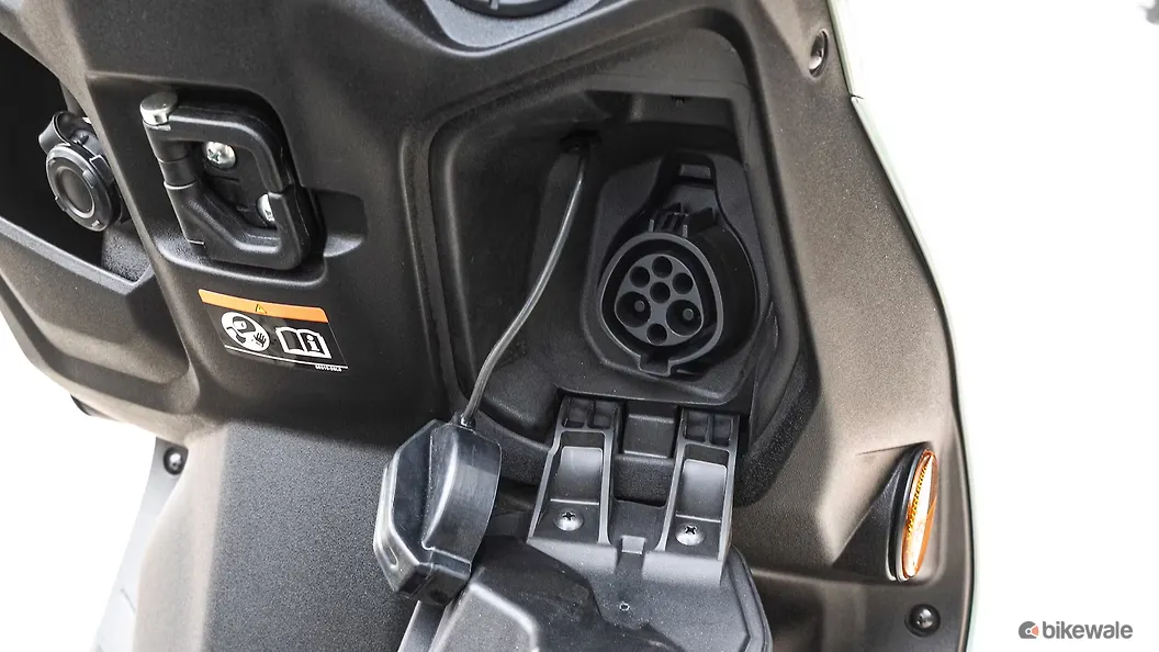 Suzuki E Access Electric Bike Charging Input Plug Image – BikeWale