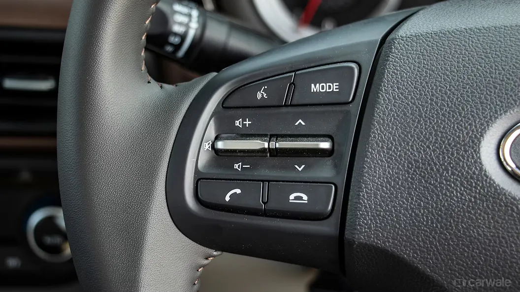 Aura Steering Mounted Audio Controls Image, Aura Photos in India - CarWale
