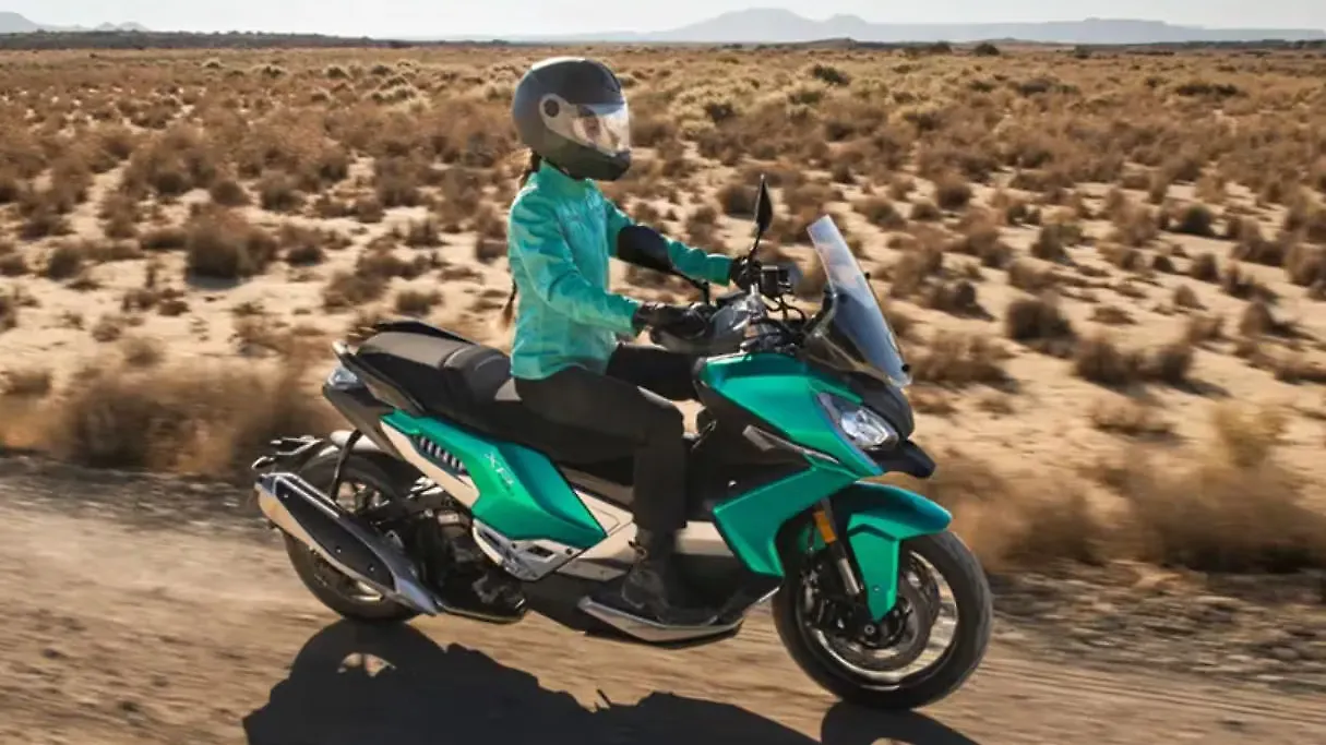 Peugeot unveils off-road ready 400cc scooter - BikeWale
