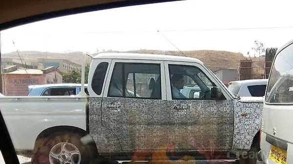 New Mahindra Scorpio Getaway spotted on test - CarWale