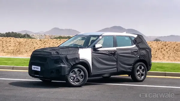 Kia offers first glimpse of the all-new SP2i SUV - CarWale