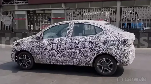 Tata Tigor facelift spied with IMPACT 2.0 design - CarWale