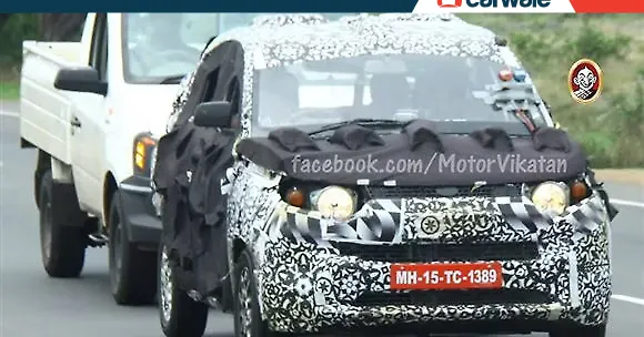 Mahindra S-101spied testing; front fascia revealed - CarWale