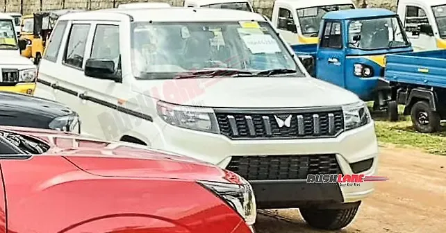 Mahindra Bolero Neo spied with the new brand logo - CarWale