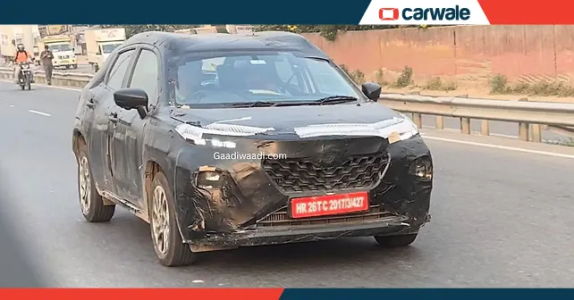 Maruti Baleno Coupe spied again; new details revealed - CarWale