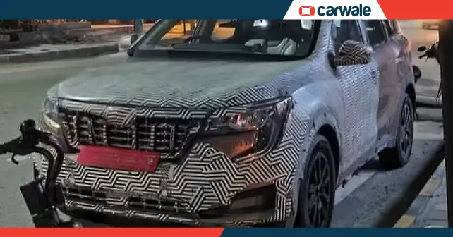 कैसा दिखता है महिंद्रा XUV700 का इलेक्ट्रिक वर्ज़न XUV.e8? - CarWale