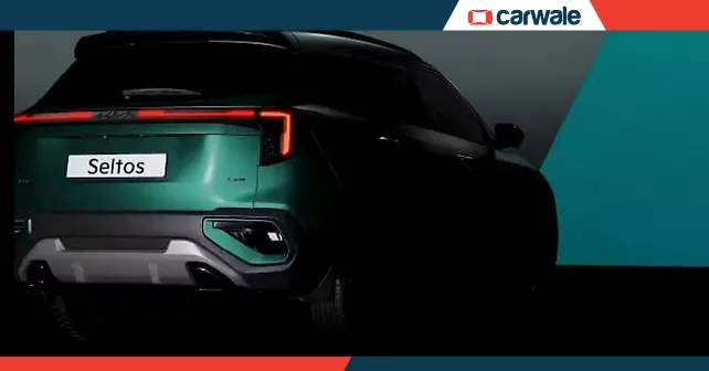 Kia Seltos facelift teased again; to get a matte green colour? - CarWale