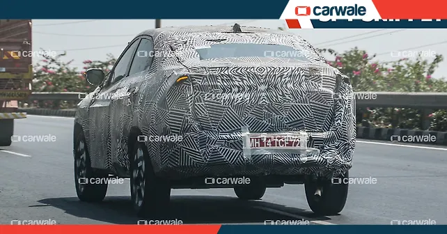 Tata Curvv spied testing; coupe SUV stance detailed - CarWale