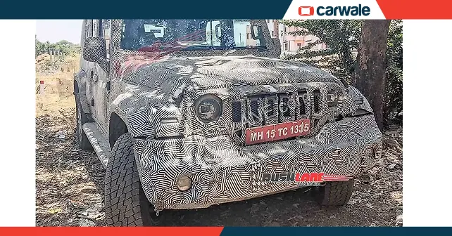 Mahindra Thar 5-door spied; second row details leaked - CarWale