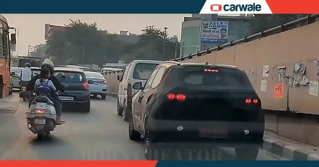 Kia QYI compact SUV spotted testing again - CarWale