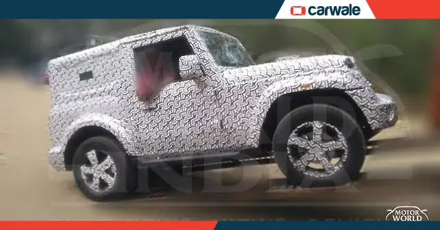 New Mahindra Thar spy shots reveal touchscreen display, interiors and ...