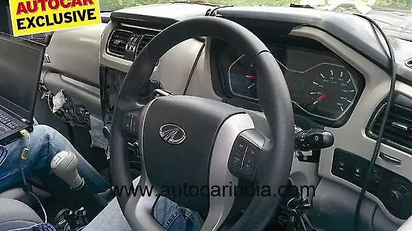 Updated Mahindra Scorpio interior revealed in new spy shots - CarWale
