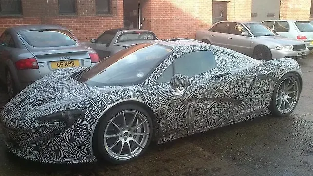 McLaren P1 found testing in full camouflage - CarWale