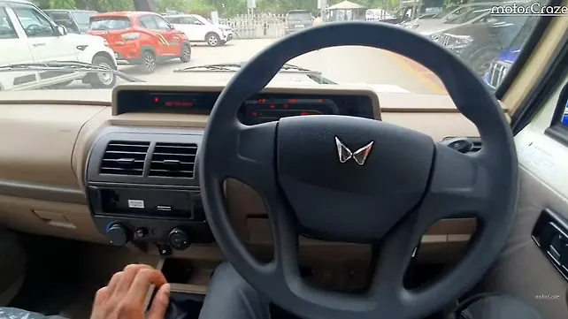 Mahindra Bolero with new logo arrives at dealer stockyard - CarWale