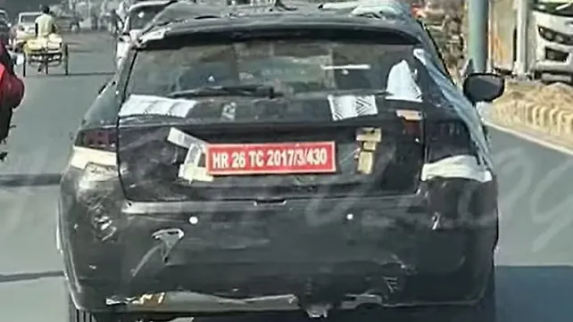 Maruti’s Coupe SUV spied alongside old Baleno - CarWale