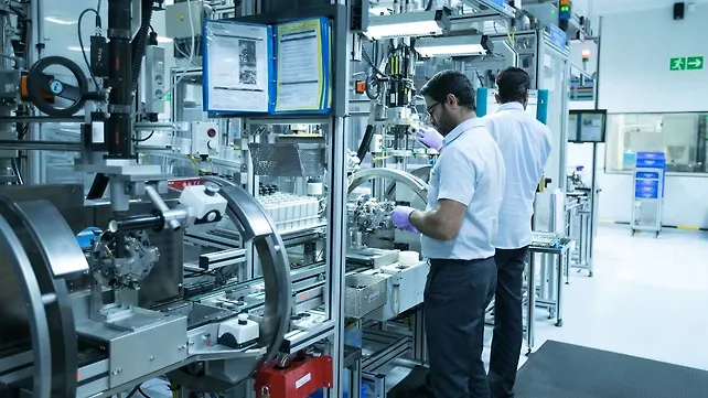 Auto comp manufacturing