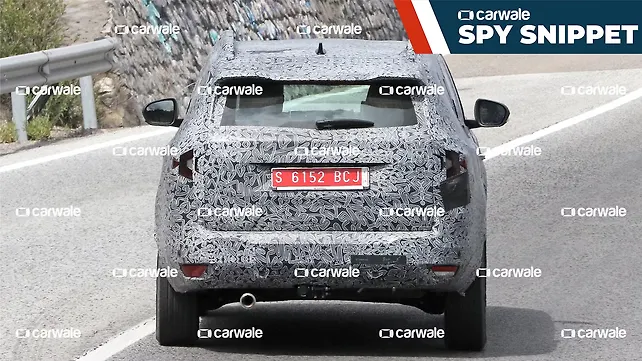 India-bound three-row Renault Duster spied on test - CarWale