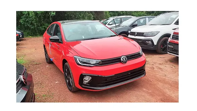 Volkswagen Virtus in New Flash Red Colour Reaches Local Dealers - CarWale
