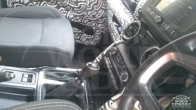 New Mahindra Thar spy shots reveal touchscreen display, interiors and ...