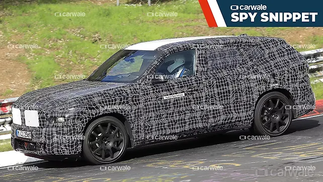 BMW X8 spied on Nurburgring exercising its hybrid powertrain - CarWale